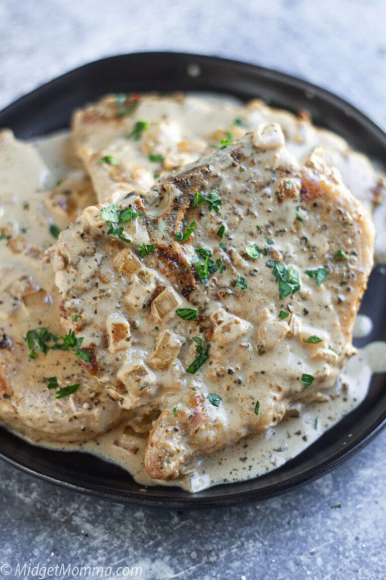 Creamy Roasted Garlic Parmesan Pork Chops Recipe • MidgetMomma