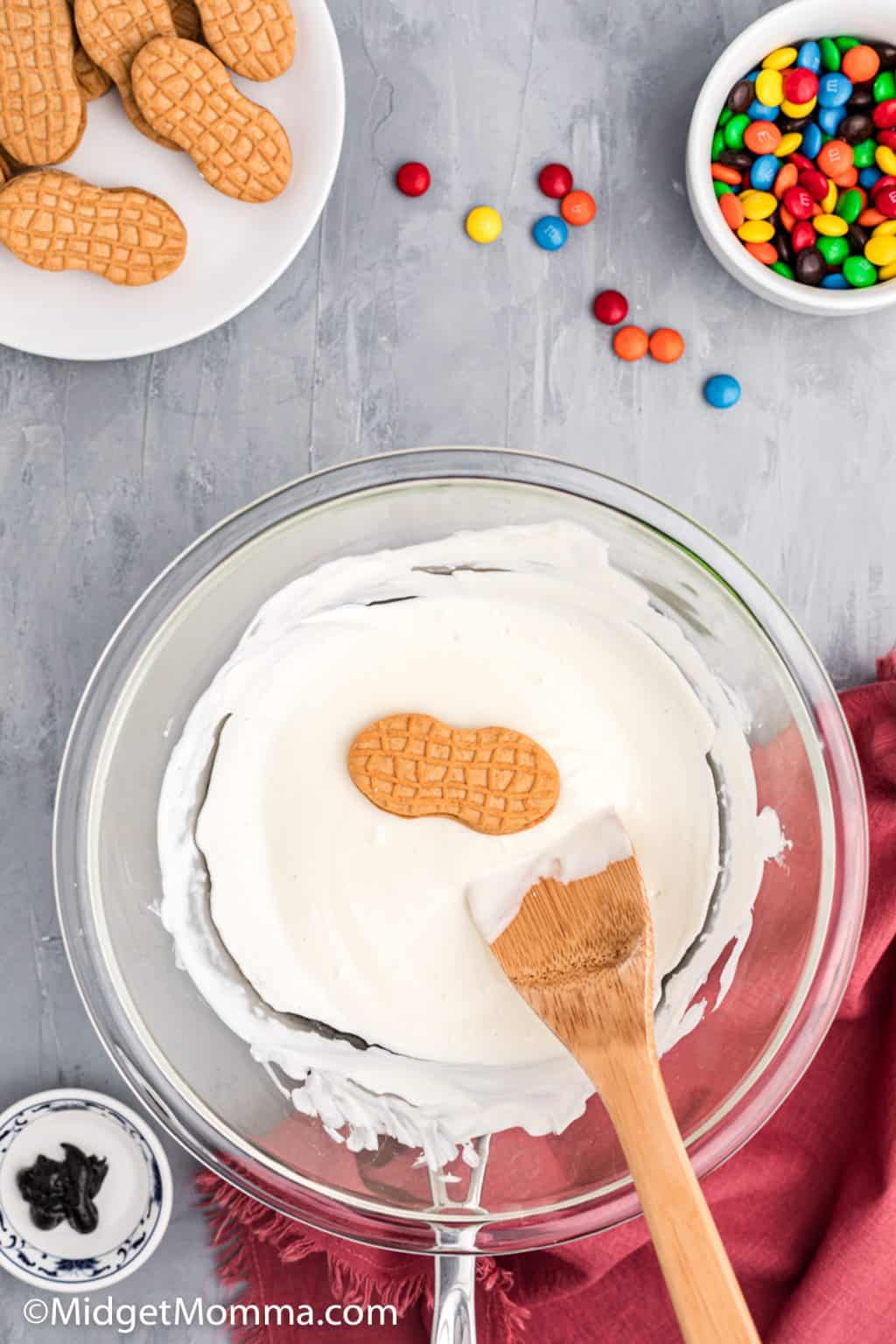 Chocolate Dipped Nutter Butter Snowman Cookies • MidgetMomma