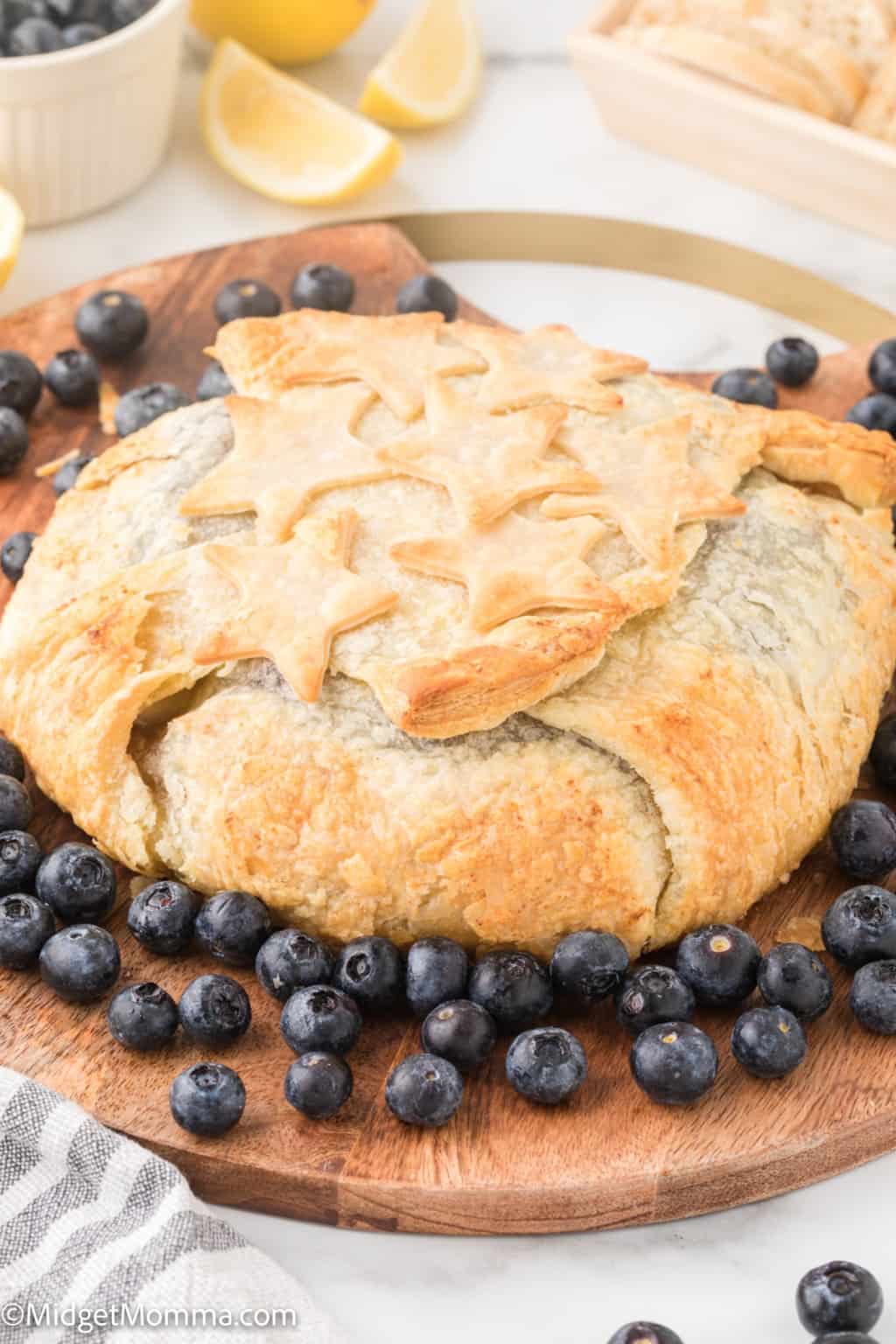 Baked Brie in Puff Pastry with Blueberry Pie Filling Recipe • MidgetMomma